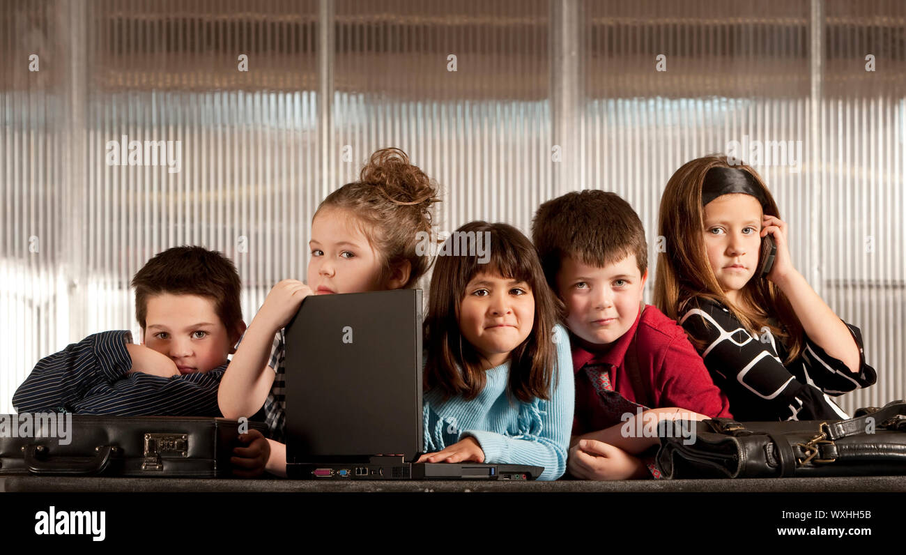 Group of kids as a business team hi-res stock photography and images ...