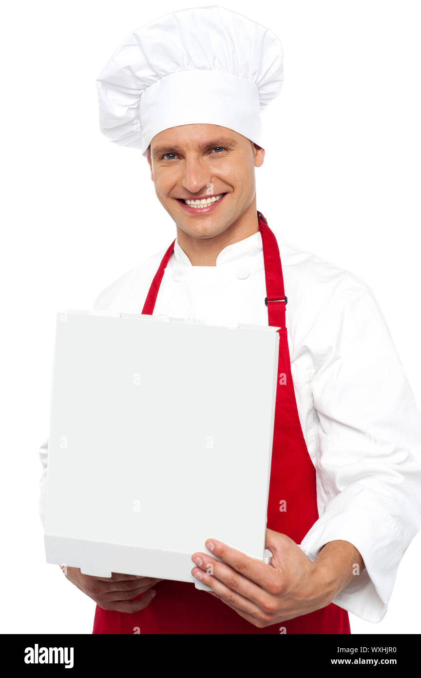 Half lenght portrait of a chef holding a pastry box isolated over white ...