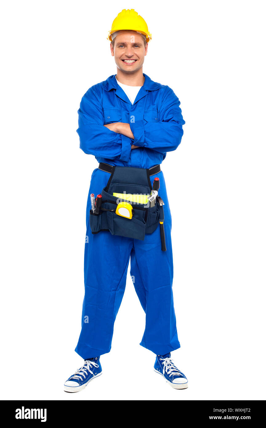 Industrial contractor posing with crossed arms isolated over white ...