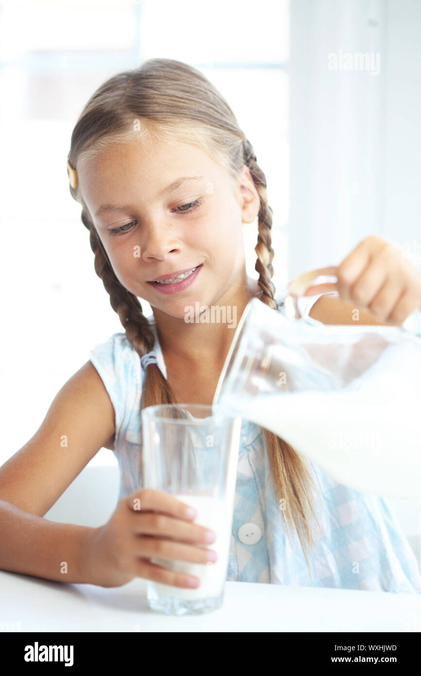 Child drinking milk in school hi-res stock photography and images - Alamy