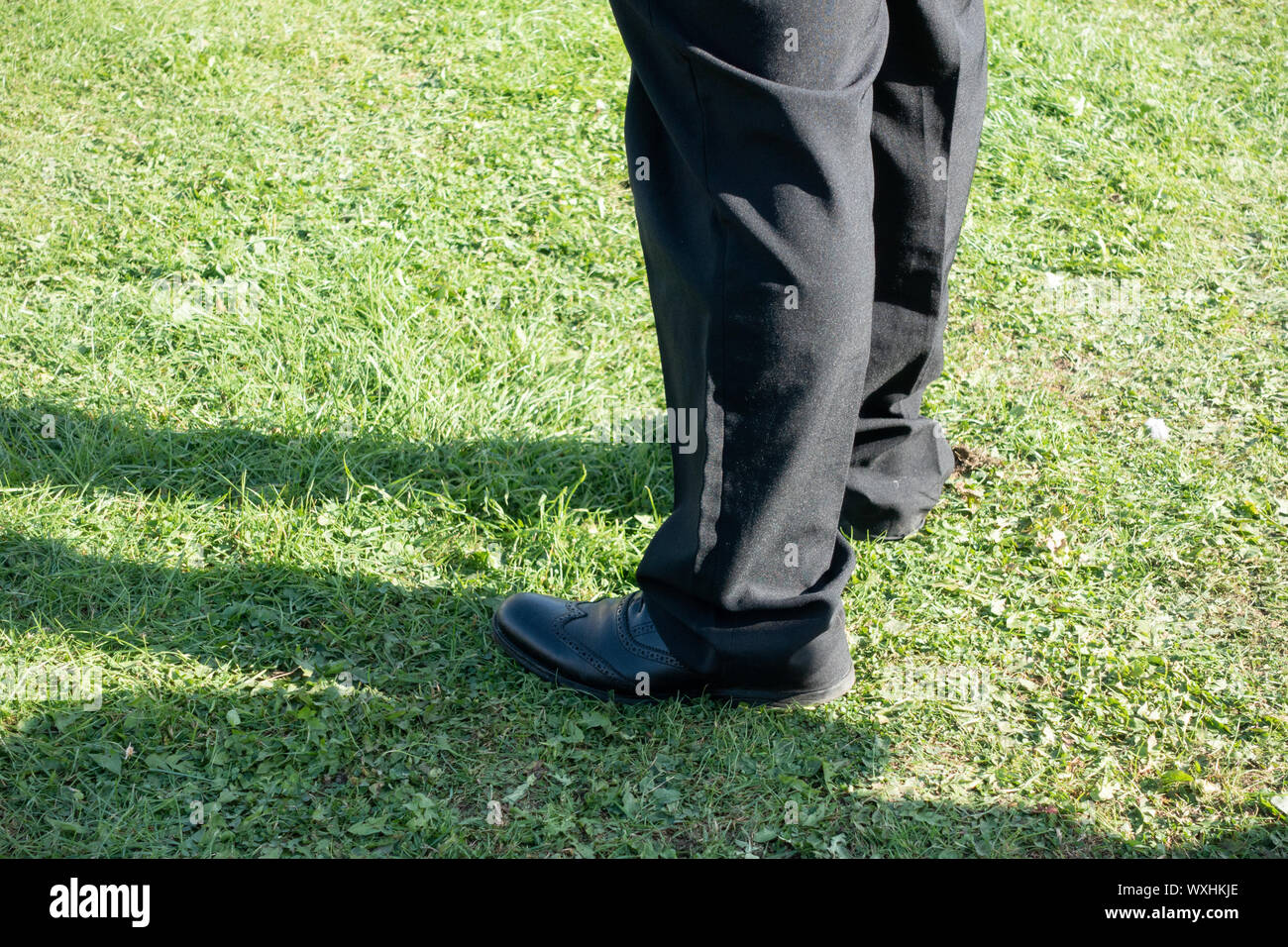 Bad fit suit Stock Photo - Alamy