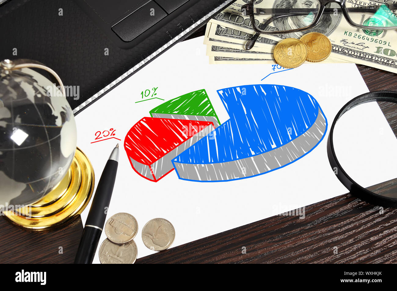 workplace with growth chart on poster Stock Photo - Alamy