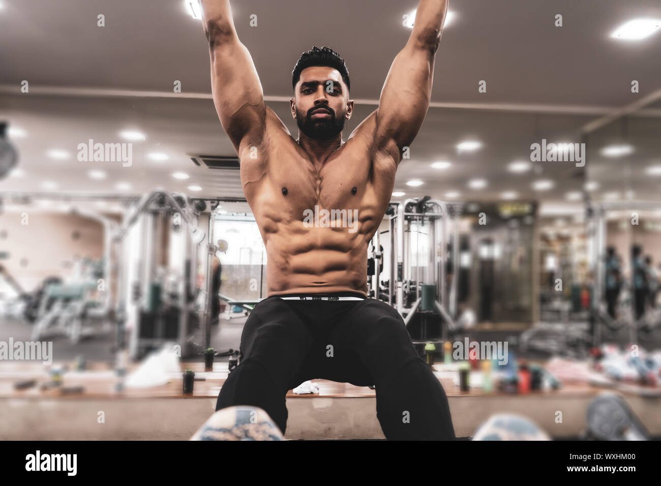 Male bodybuilder flexing his biceps hi-res stock photography and images ...