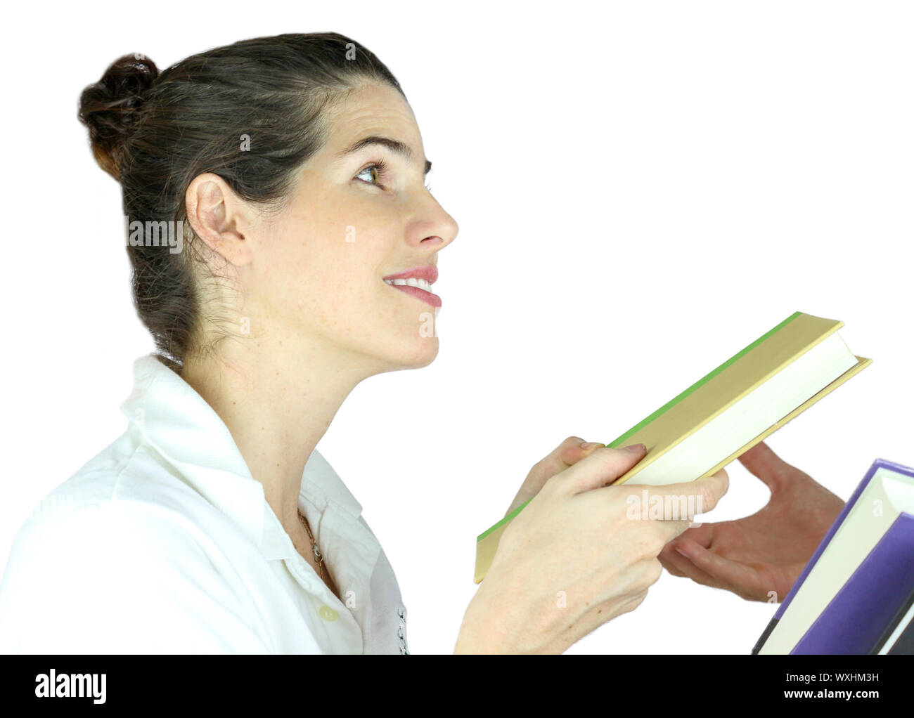 A pretty young teacher giving homework to student Stock Photo - Alamy