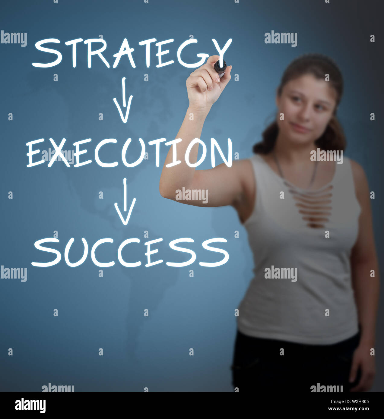 Success concept: Businesswoman drawing a success concept on a ...