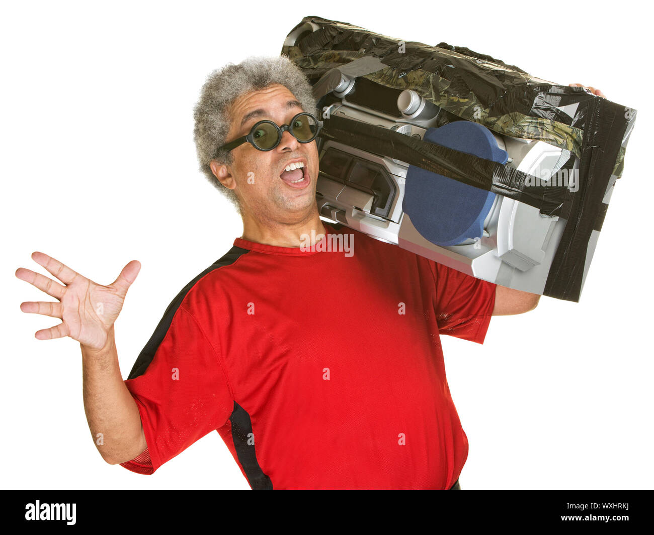Excited singing mature man with boom box Stock Photo - Alamy
