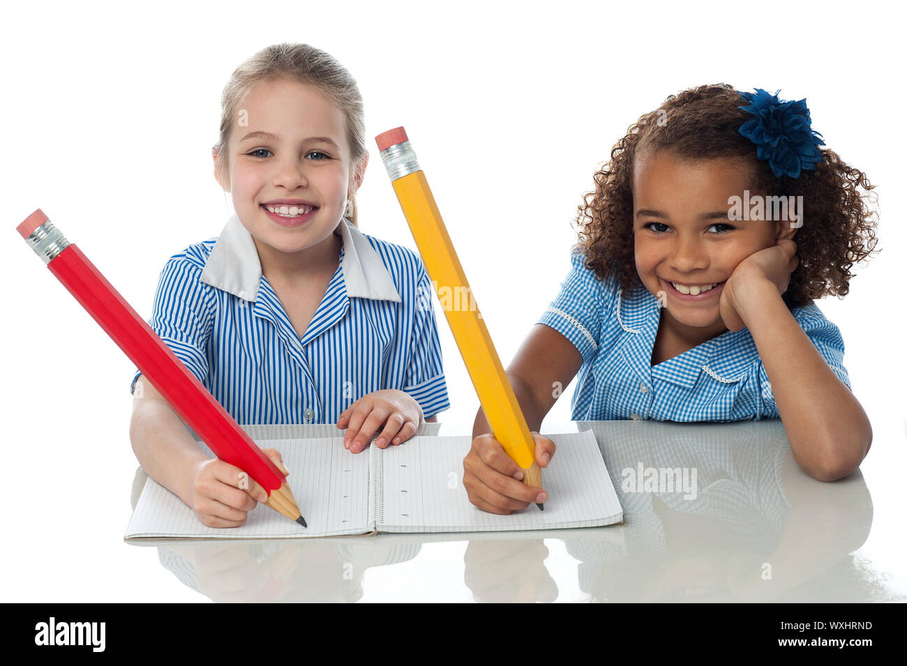 School girls doing homework together Stock Photo - Alamy