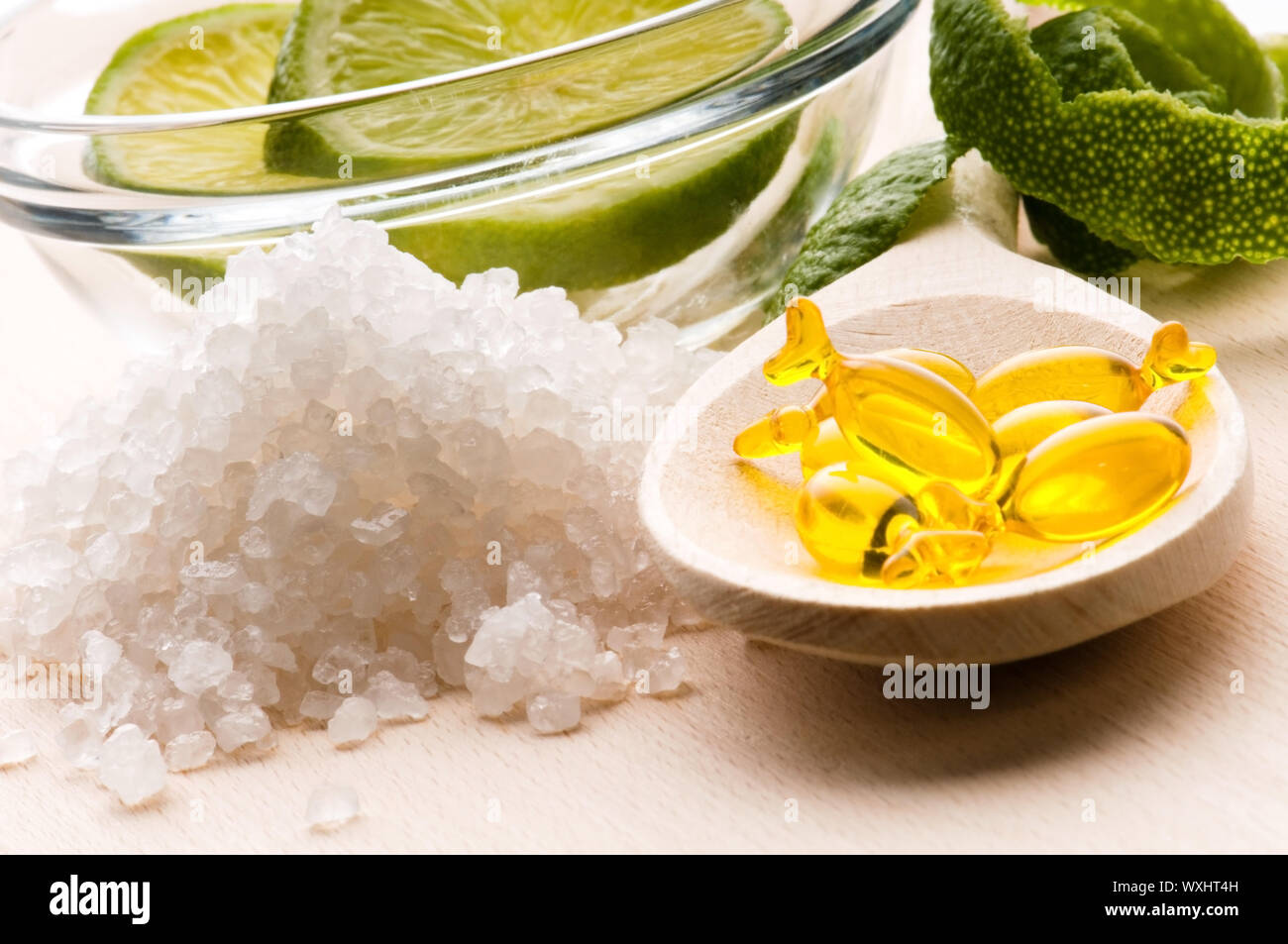 lemon bath - bath salt, capsule and fresh fruits Stock Photo - Alamy