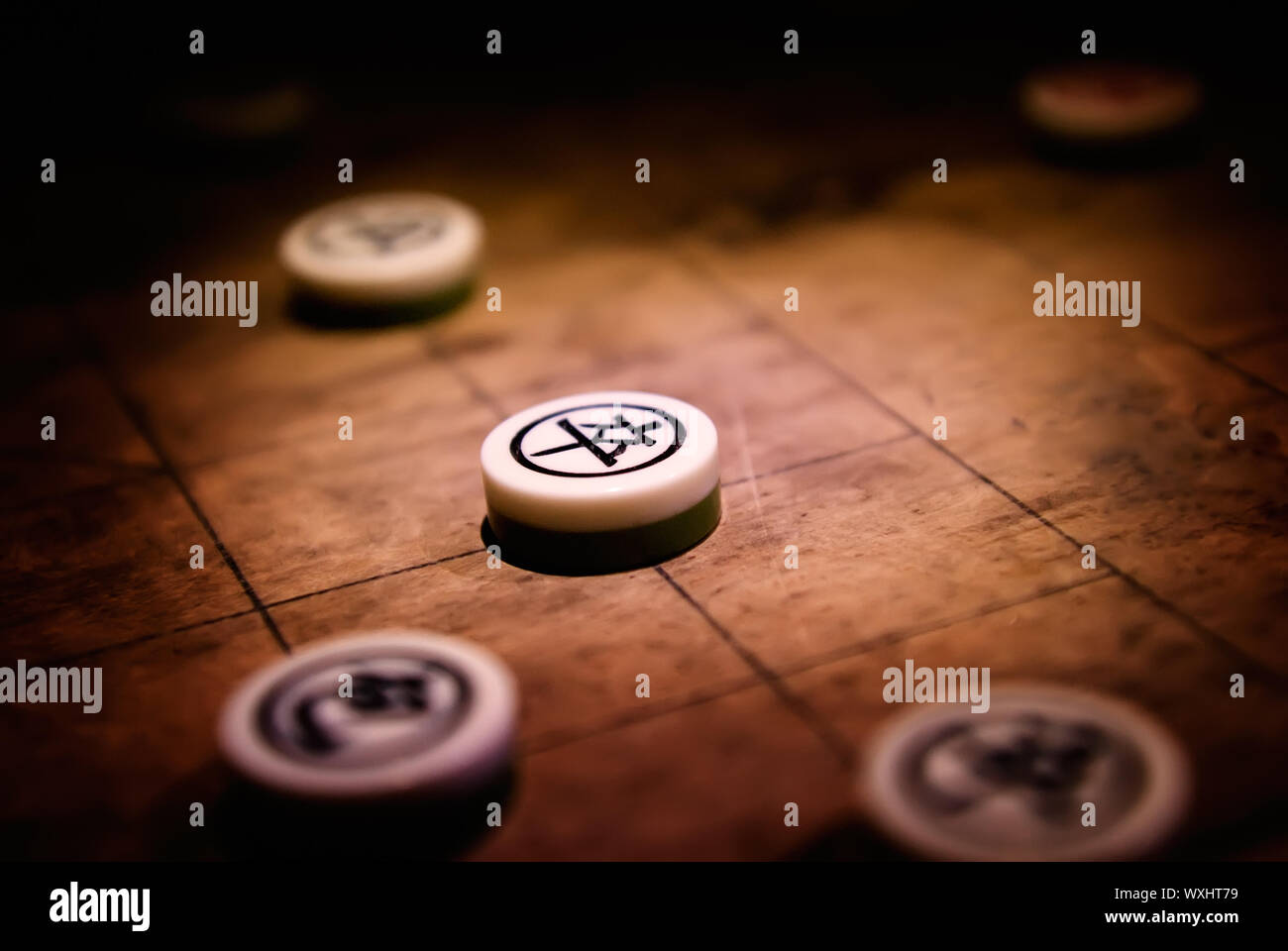 Chinese chess with weak light in the night Stock Photo - Alamy