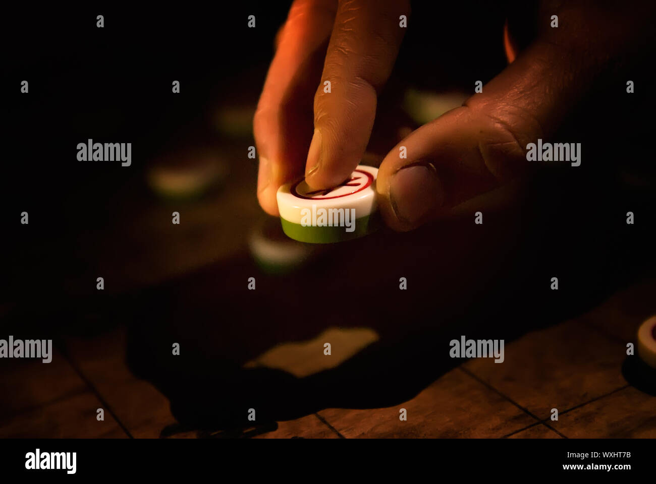 Chinese chess with weak light in the night Stock Photo - Alamy