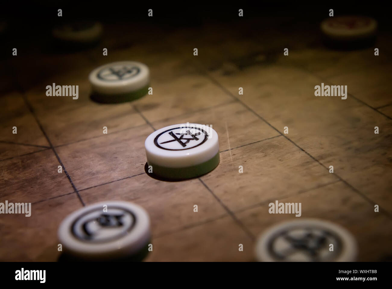Chinese chess with weak light in the night Stock Photo - Alamy