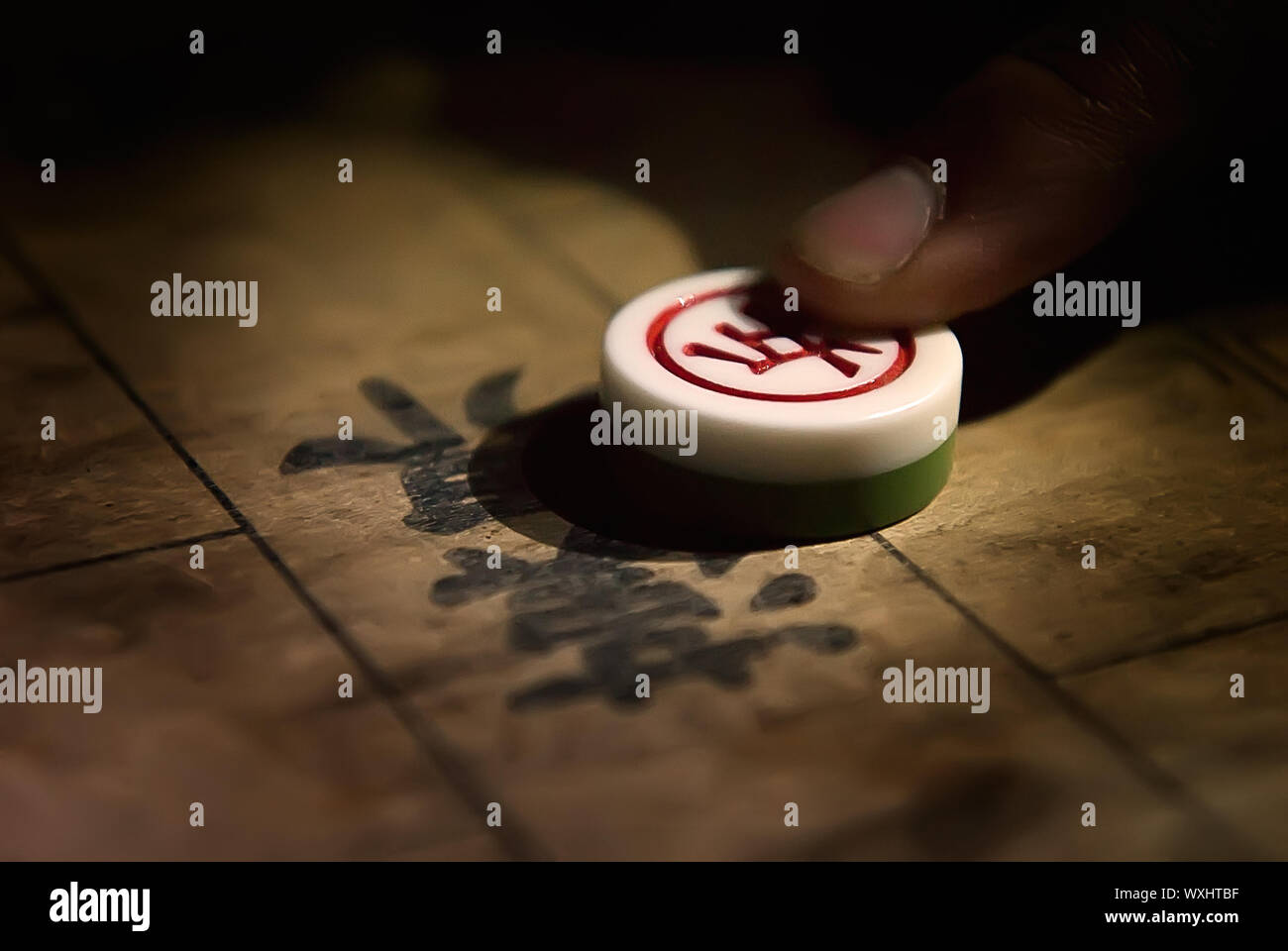 Chinese chess with weak light in the night Stock Photo - Alamy