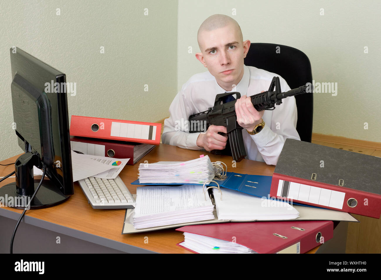 The chief accountant armed with a rifle Stock Photo - Alamy