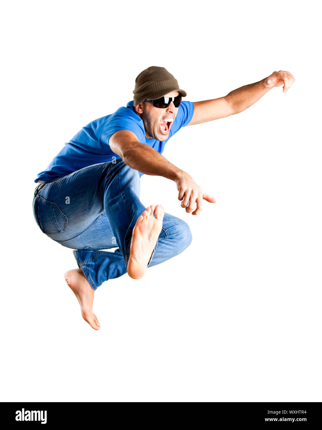 Young man jumping isolated over a white background Stock Photo - Alamy
