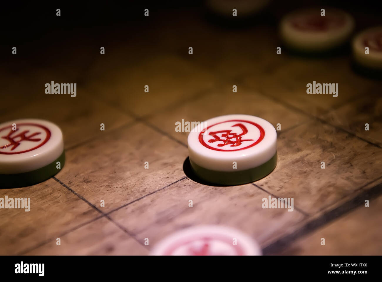 Chinese chess with weak light in the night Stock Photo - Alamy