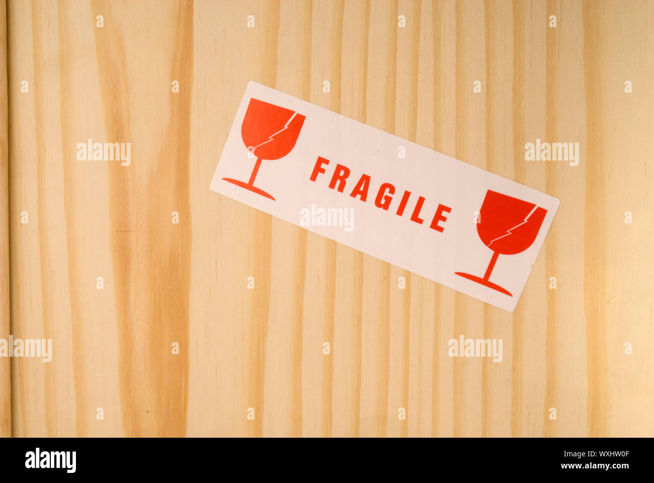 Wooden box with fragile on it Stock Photo - Alamy