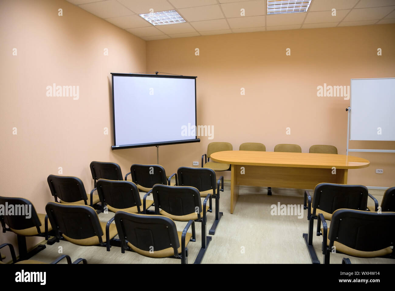 Interior of a small conference hall in pink tones Stock Photo - Alamy