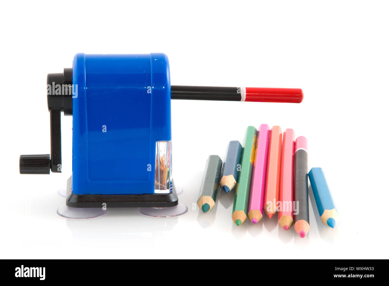 Pencil sharpener with colorful pencils Stock Photo - Alamy