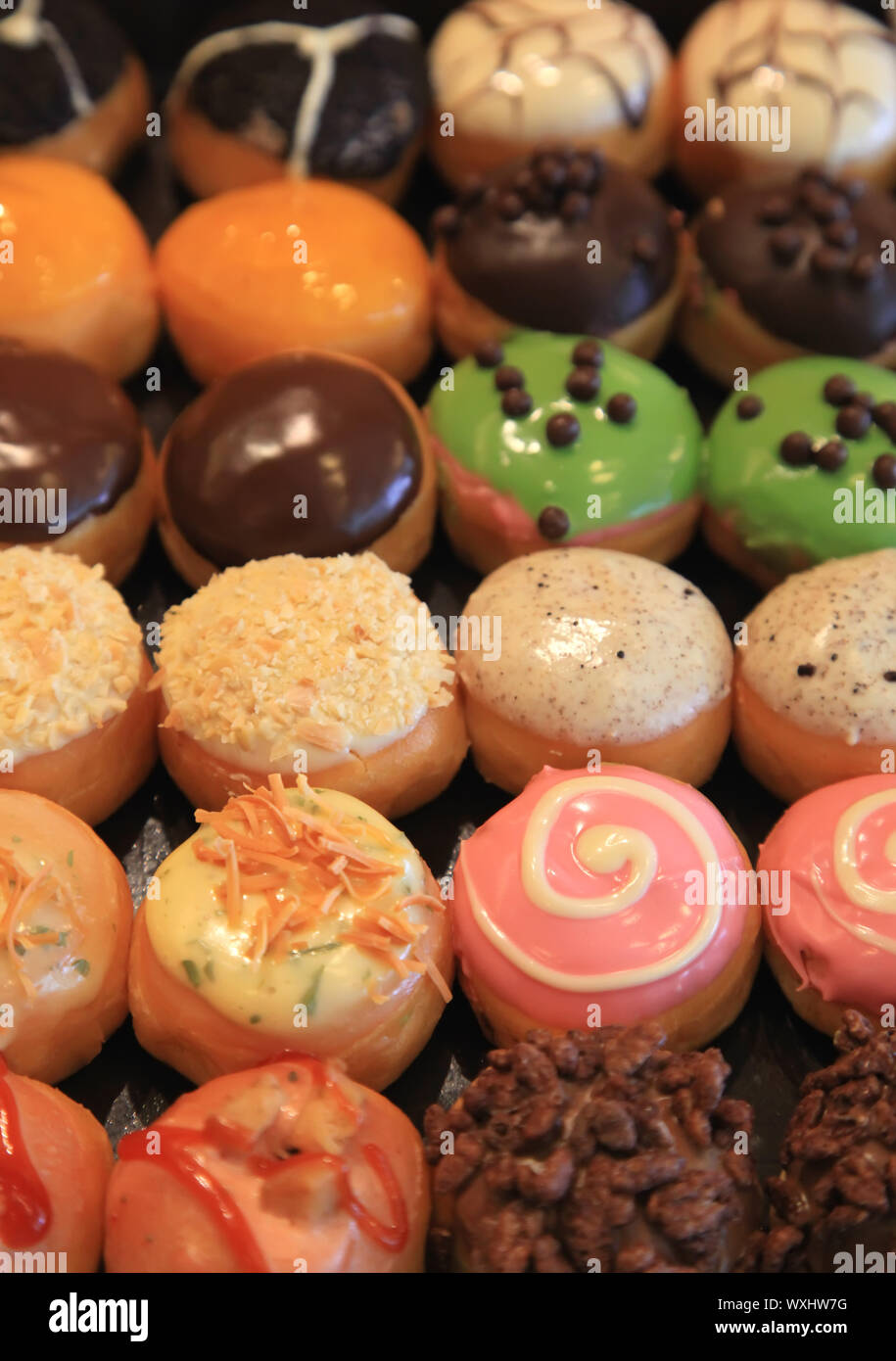 Assorted Donuts Variety in Dessert Store Shop Stock Photo - Alamy
