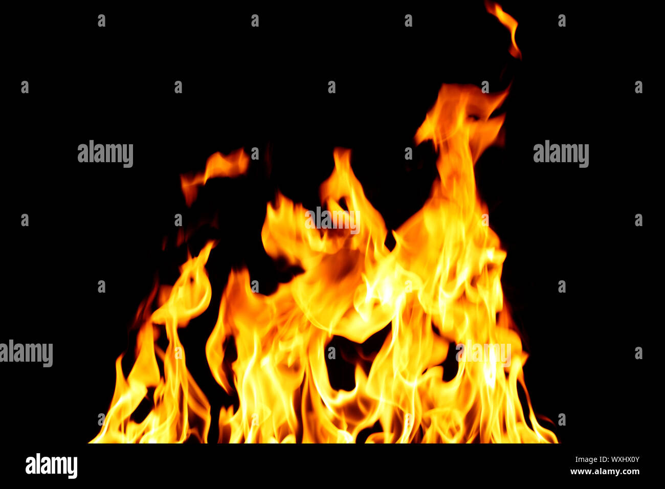 inferno flame fire on black background close up Stock Photo - Alamy