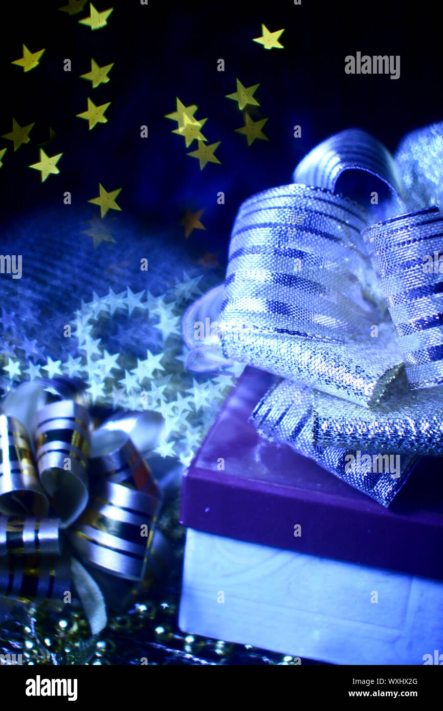 holiday gifts background warm stars Stock Photo - Alamy