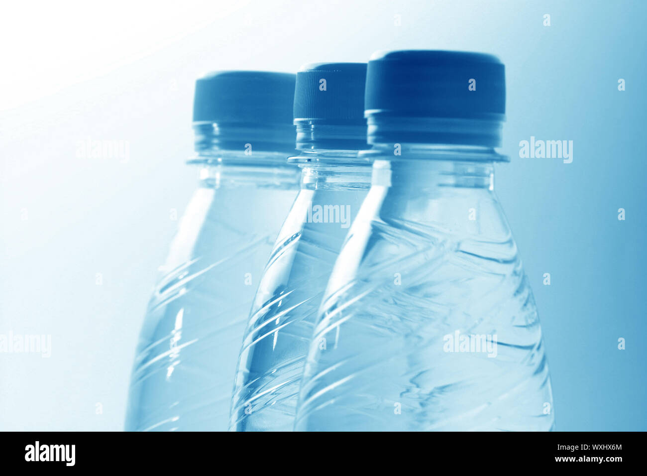 clear cold blue water in bottle Stock Photo - Alamy