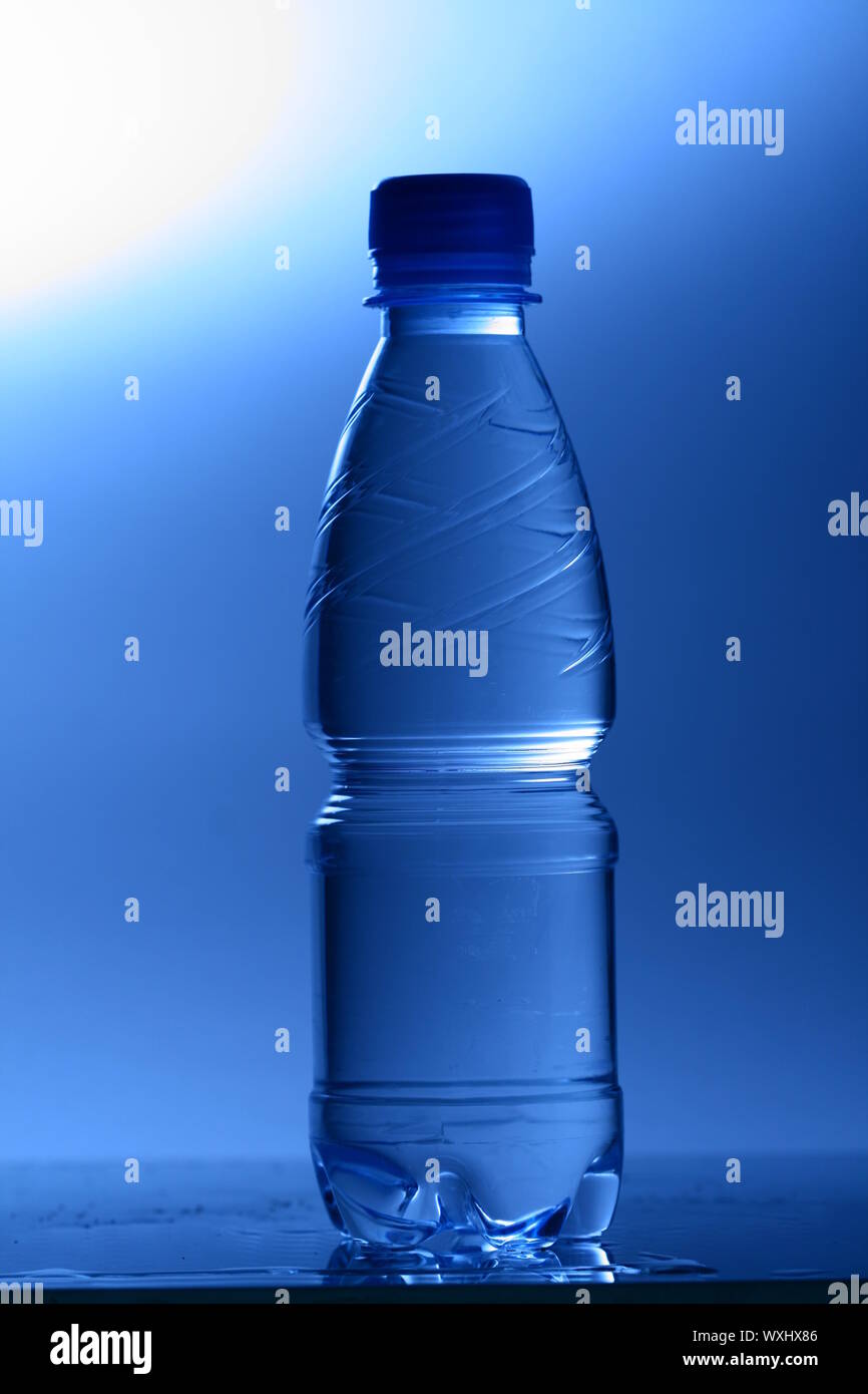clear cold blue water in bottle Stock Photo - Alamy