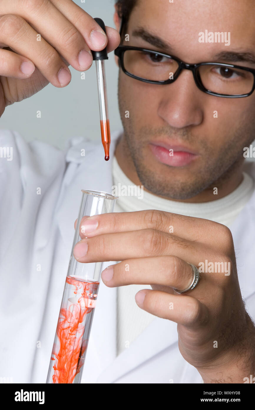 Man doing science experiment Stock Photo - Alamy