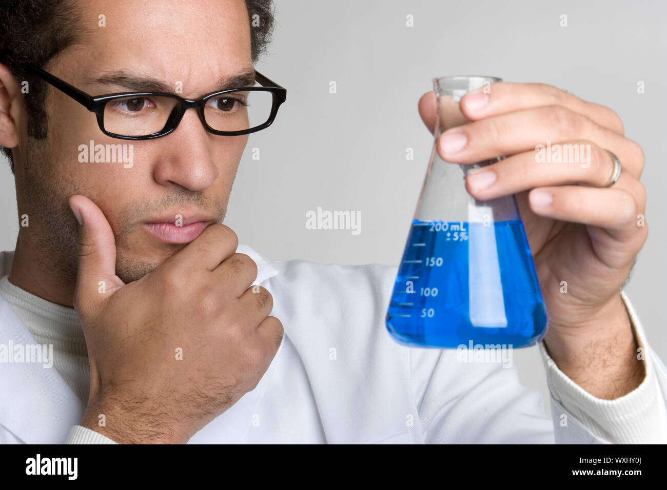 Thinking Scientist Man Stock Photo - Alamy