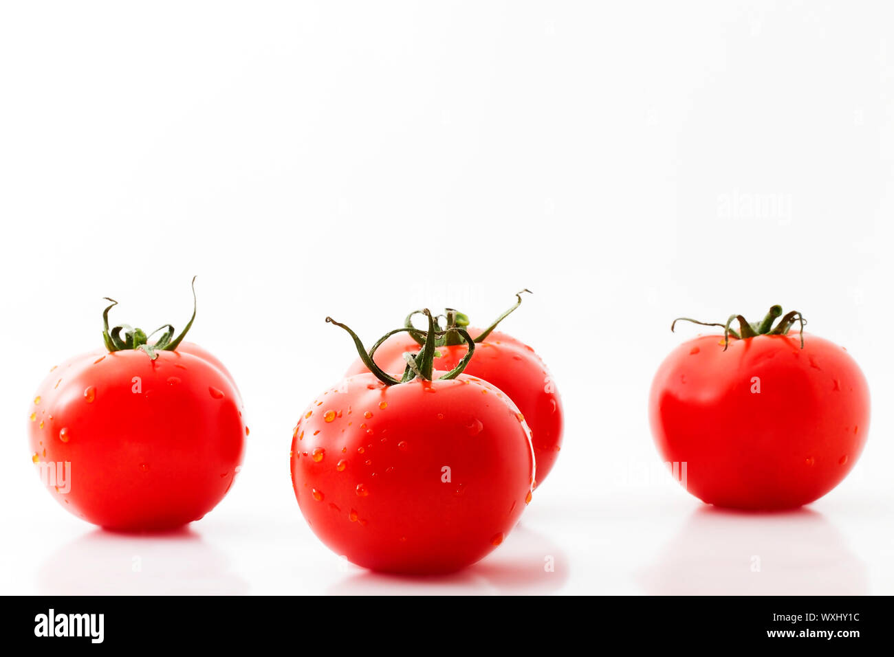 Three green tomatos hi-res stock photography and images - Alamy