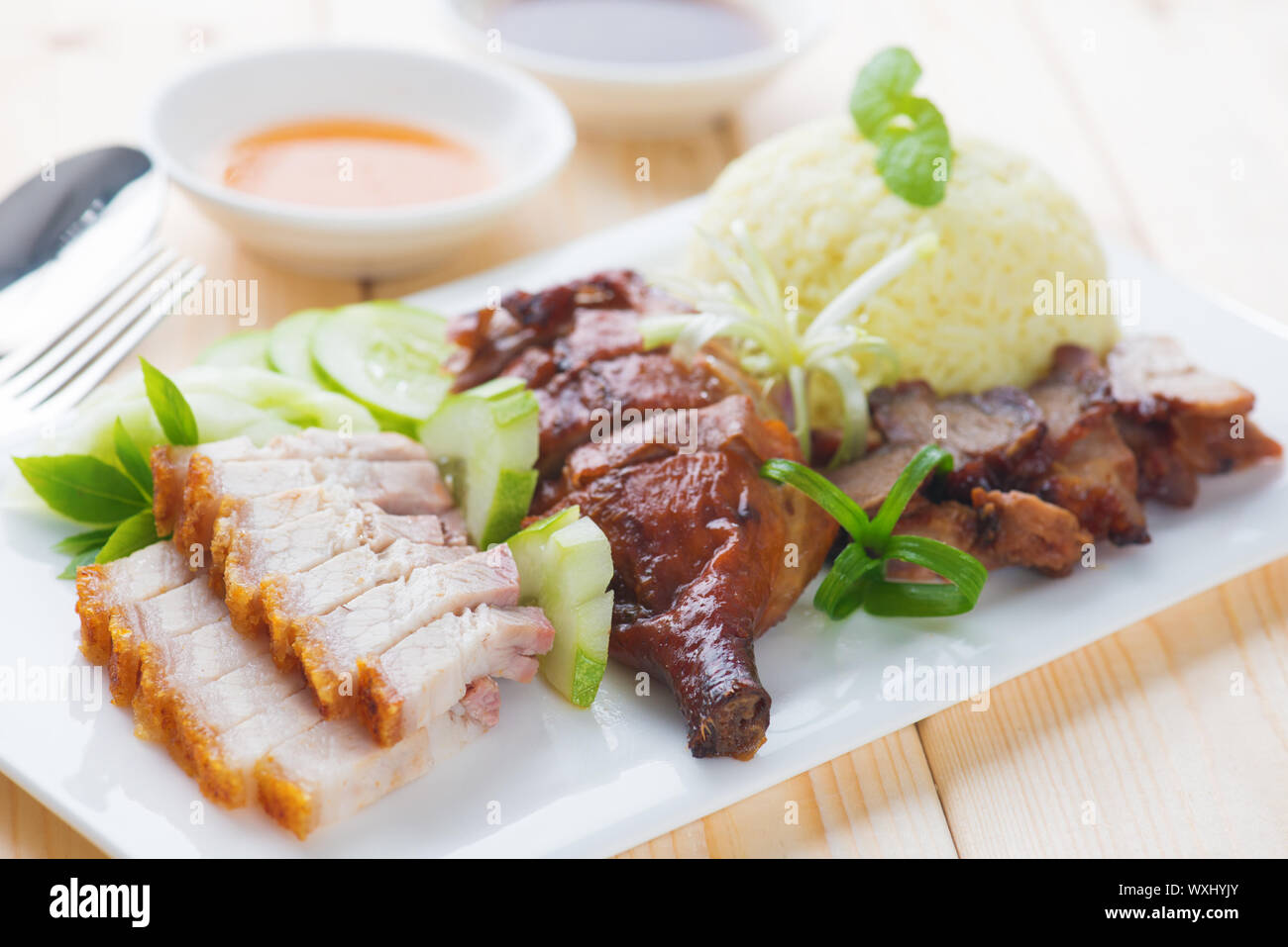 Table pork pig siu yuk char cha siew siu hi-res stock photography and ...