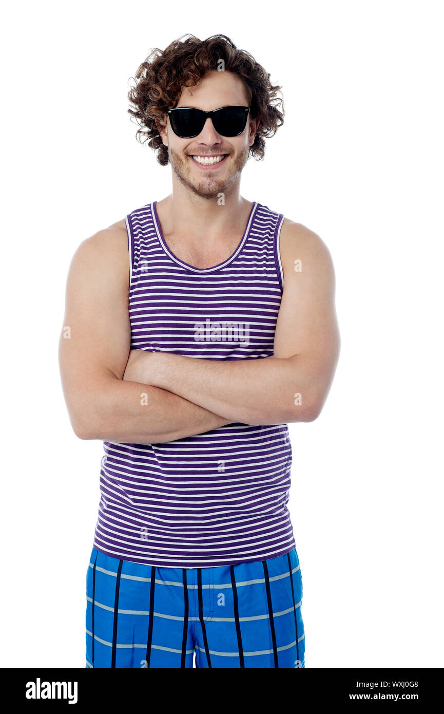 Happy man with sunglasses in a beach holiday wear Stock Photo - Alamy