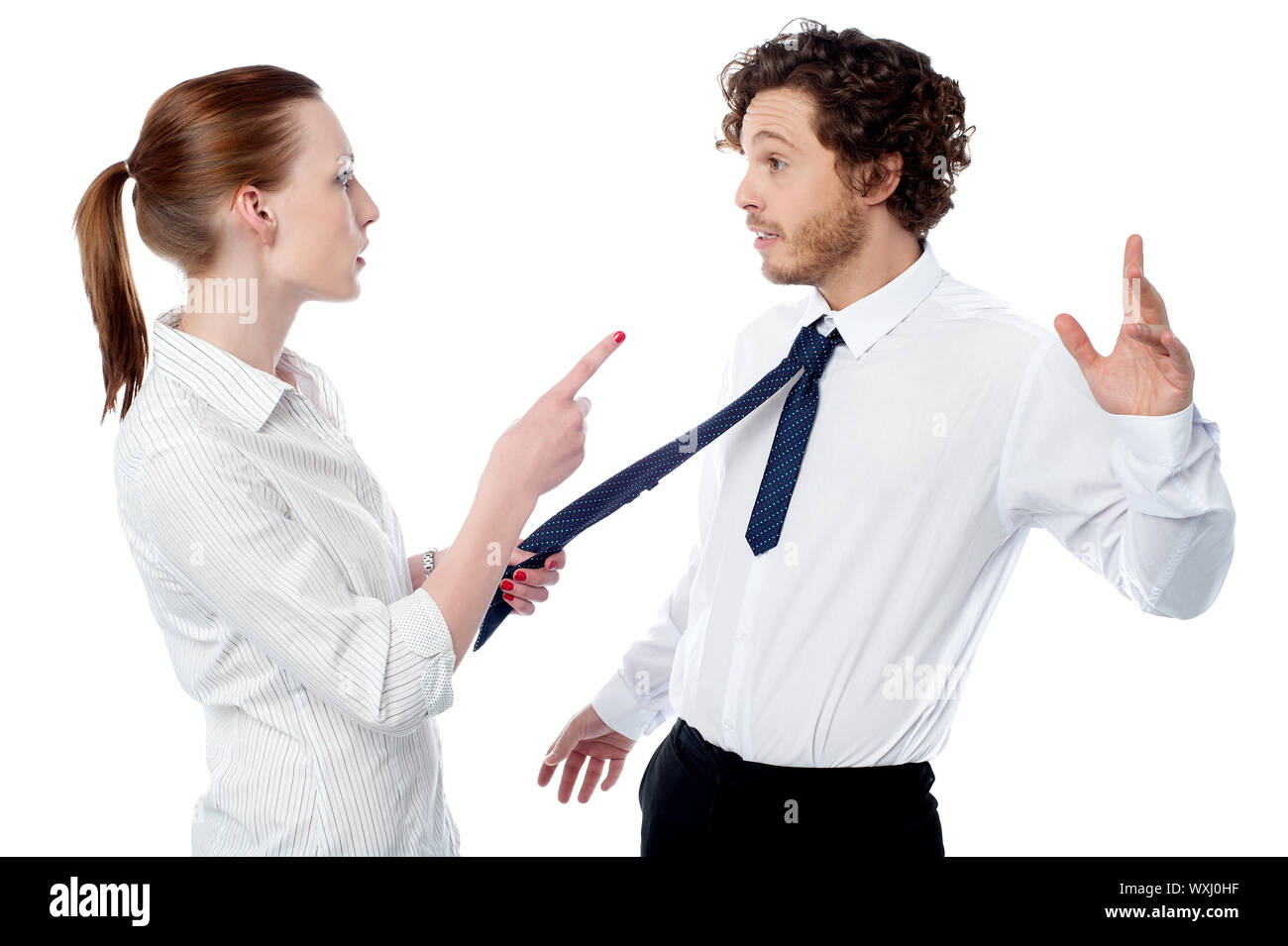 Female executive scolding her coworker Stock Photo - Alamy