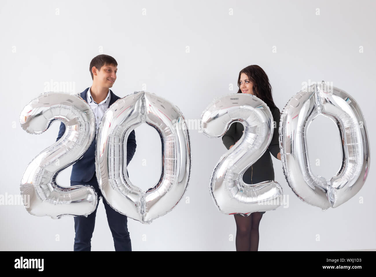 New year, celebration and holidays concept - love couple having fun ...