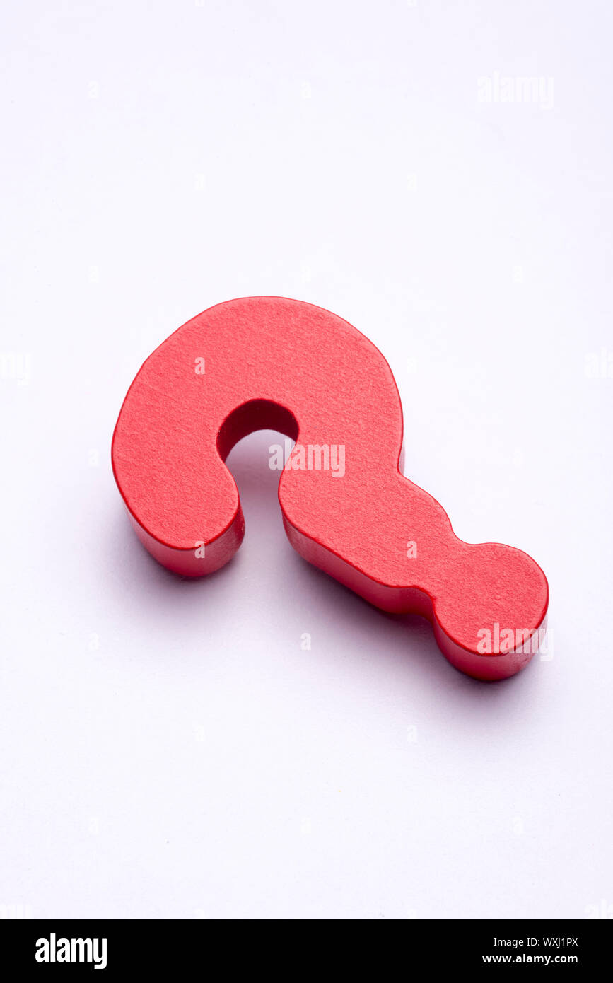 Question mark symbol miniature object on a isolated white background ...