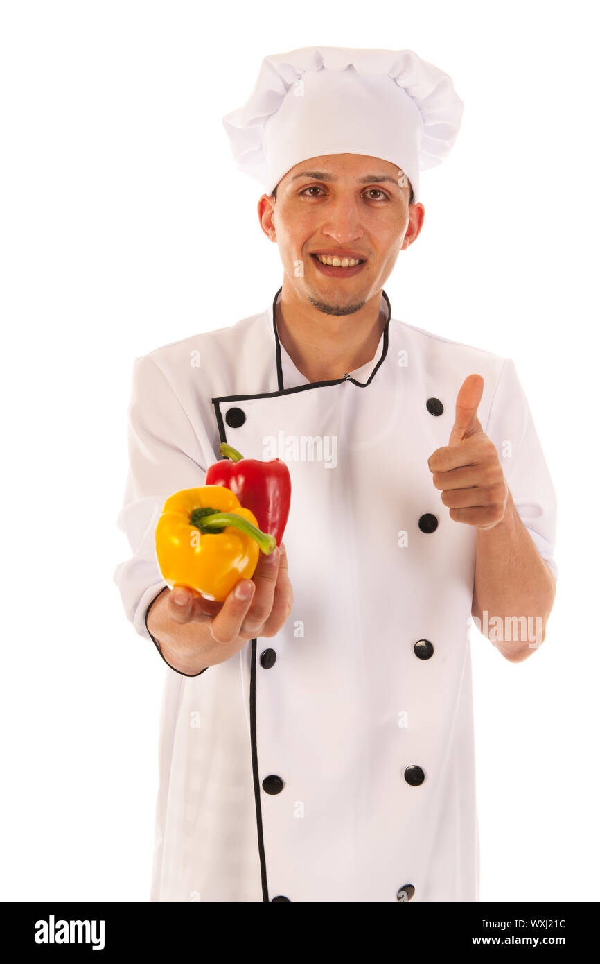 Cook thumbs up for fresh paprikas isolated over white background Stock ...