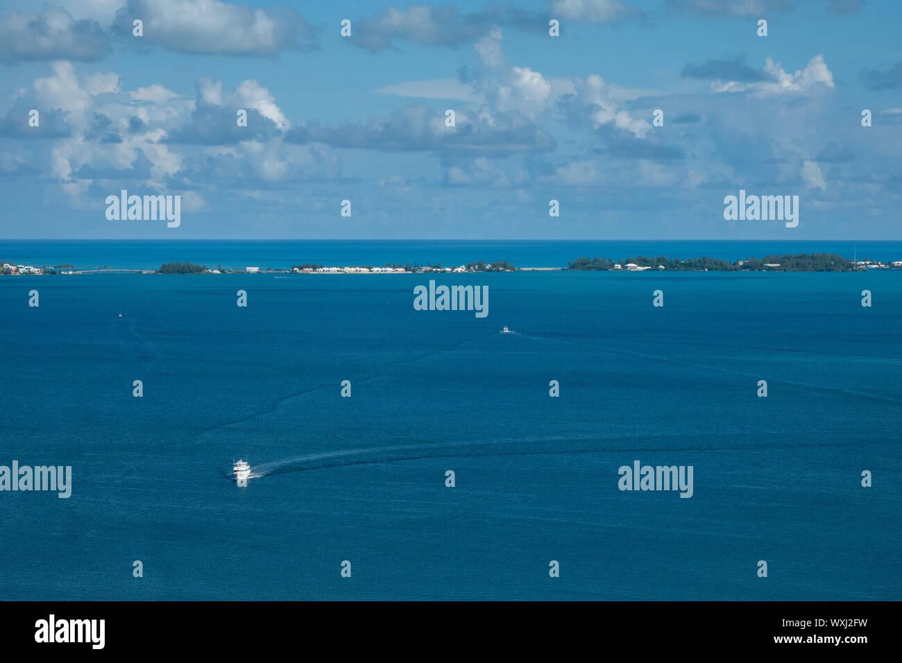 Dark rich blue Caribbean sea with horizon half and half with blue sky ...