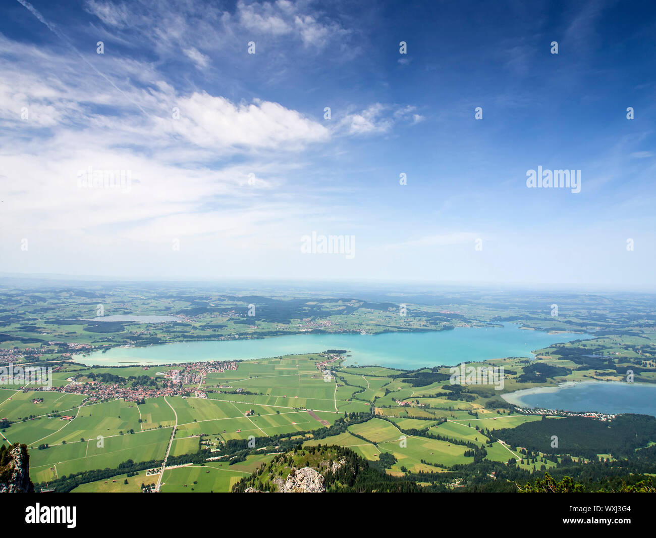 Landscape with lake Forggensee Bavaria and villages, lakes, meadows and ...