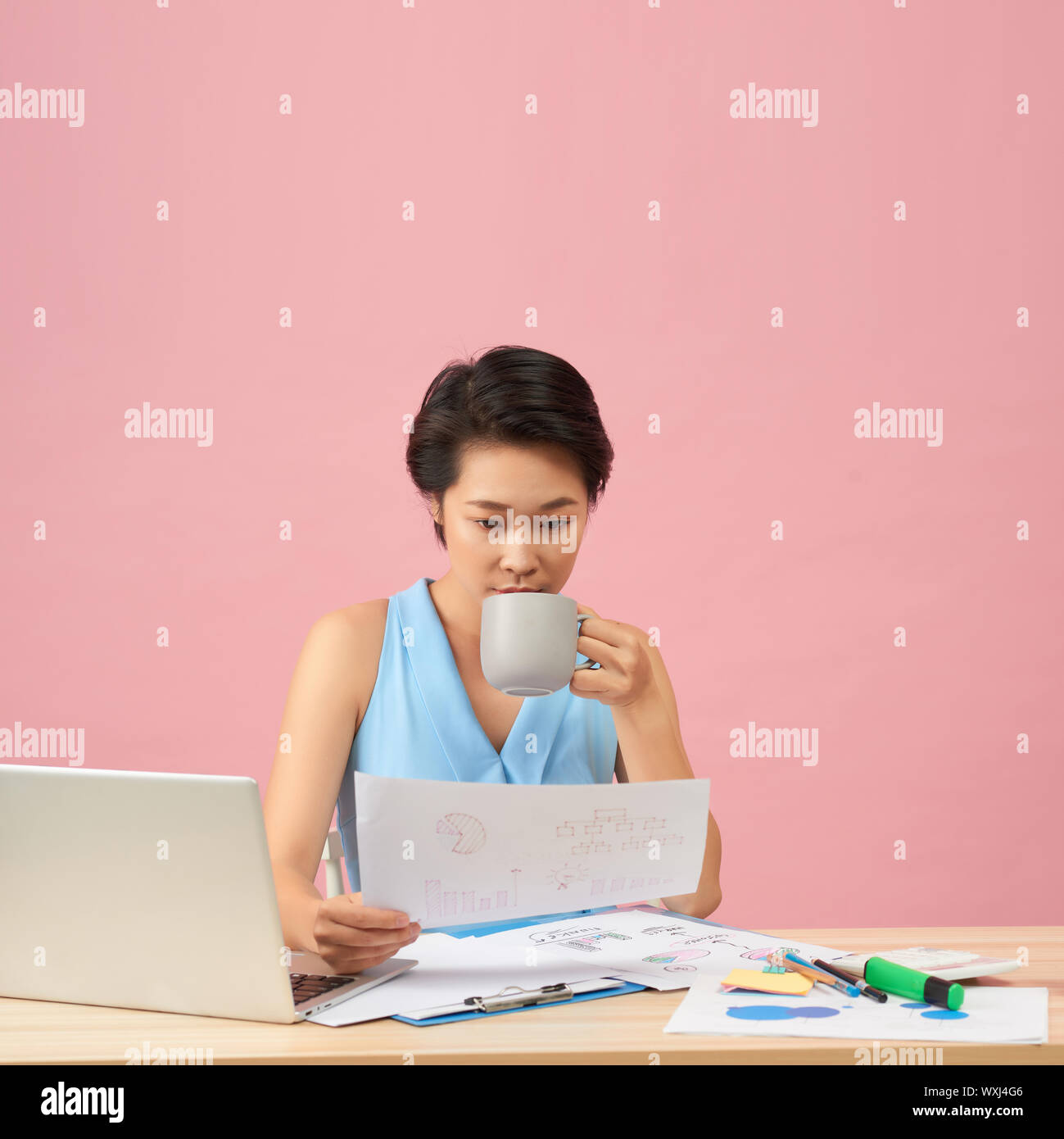 Attractive office worker hi-res stock photography and images - Alamy
