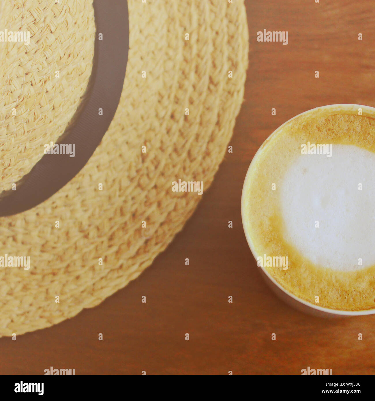 Cappuccino or latte coffee with hat, retro filter effect Stock Photo ...