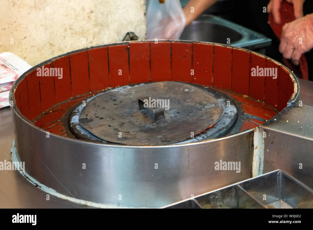 Taipei, Taiwan: Closed cylindrical clay oven (Tandoori oven) baking ...