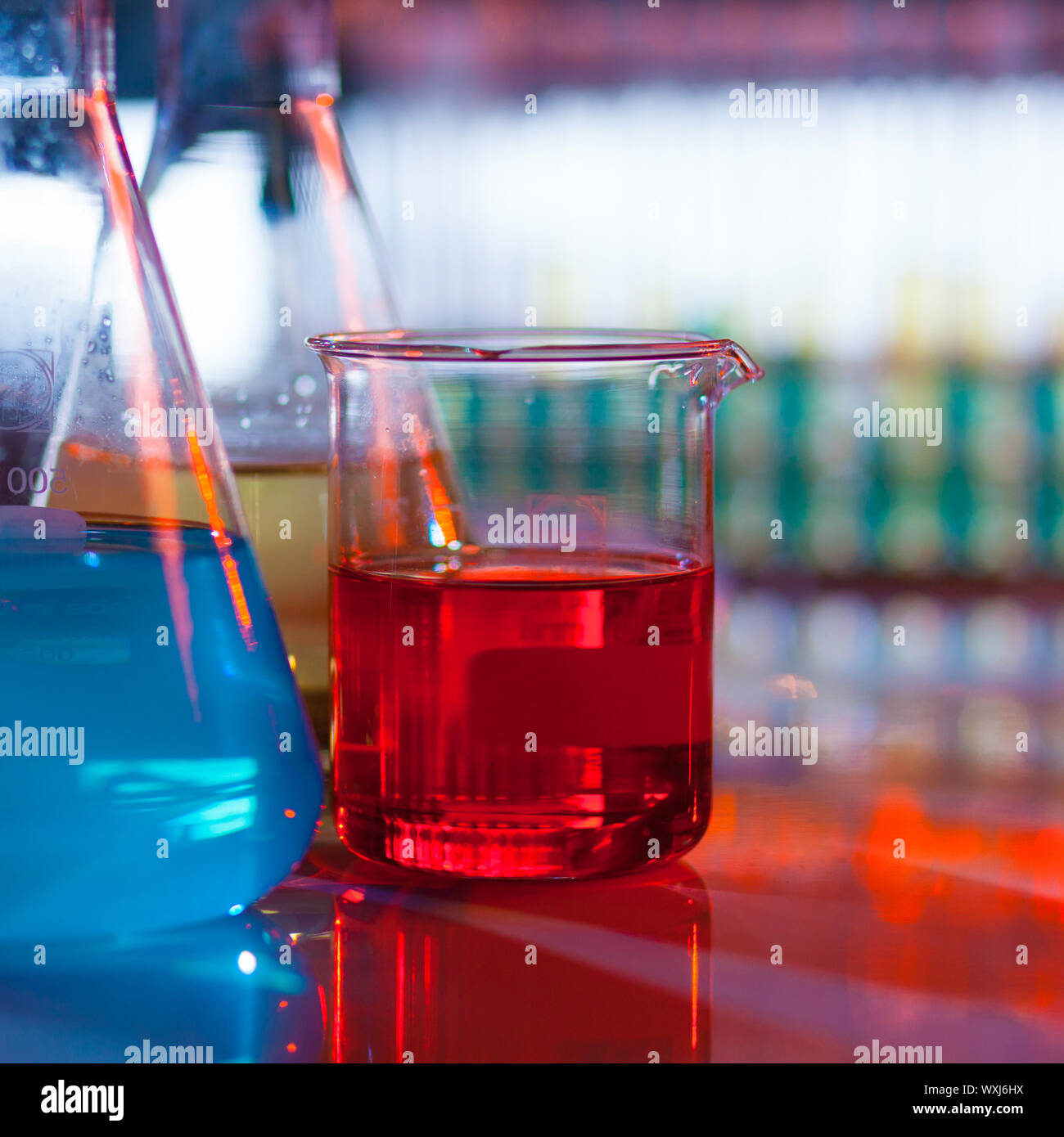Erlenmeyer flask containing green hi-res stock photography and images ...
