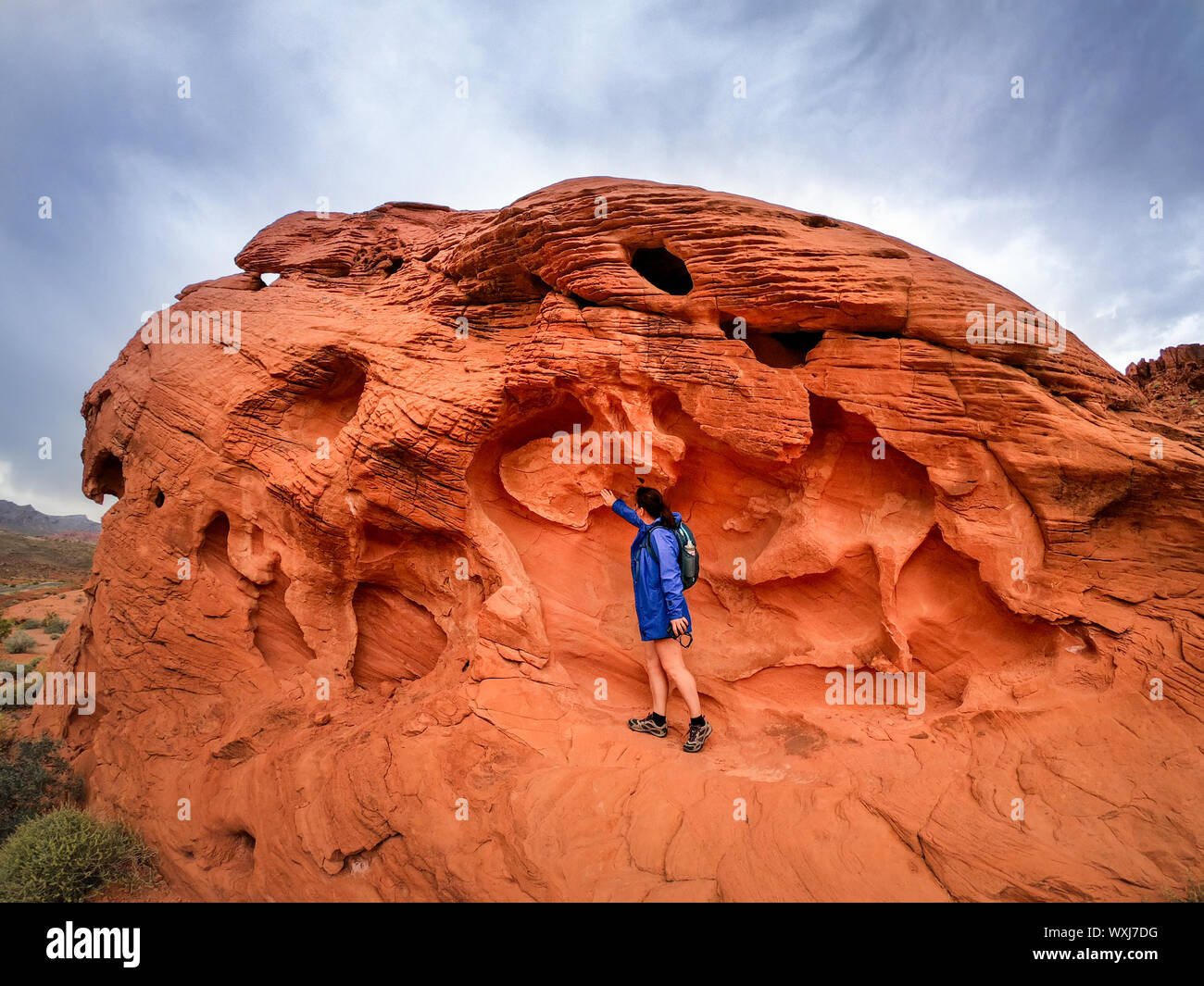 Female hiker looking at rocks, Utah, United States Stock Photo - Alamy
