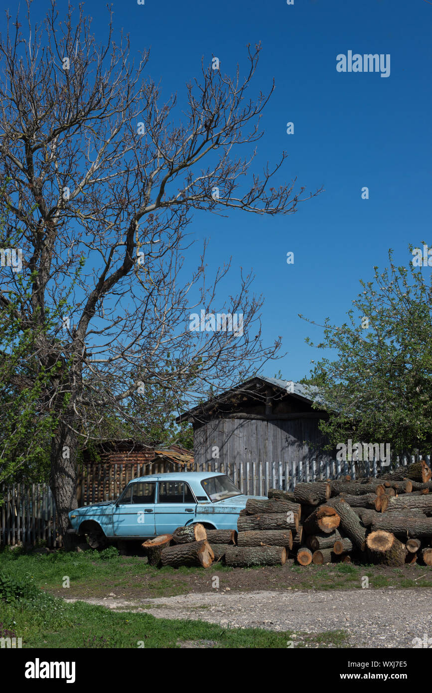 Car parked outside a wooden shack, Bulgaria Stock Photo - Alamy