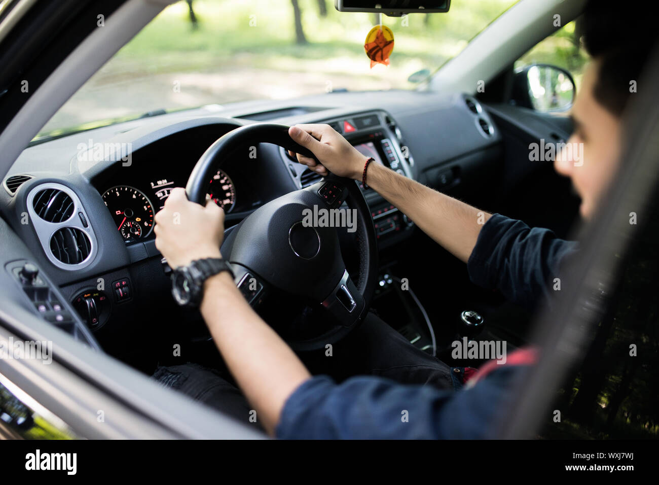 Indian boy driving a car hi-res stock photography and images - Alamy