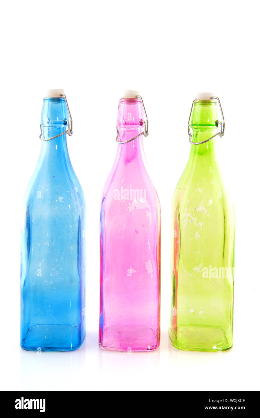 empty colorful glass bottles in colors isolated over white Stock Photo ...