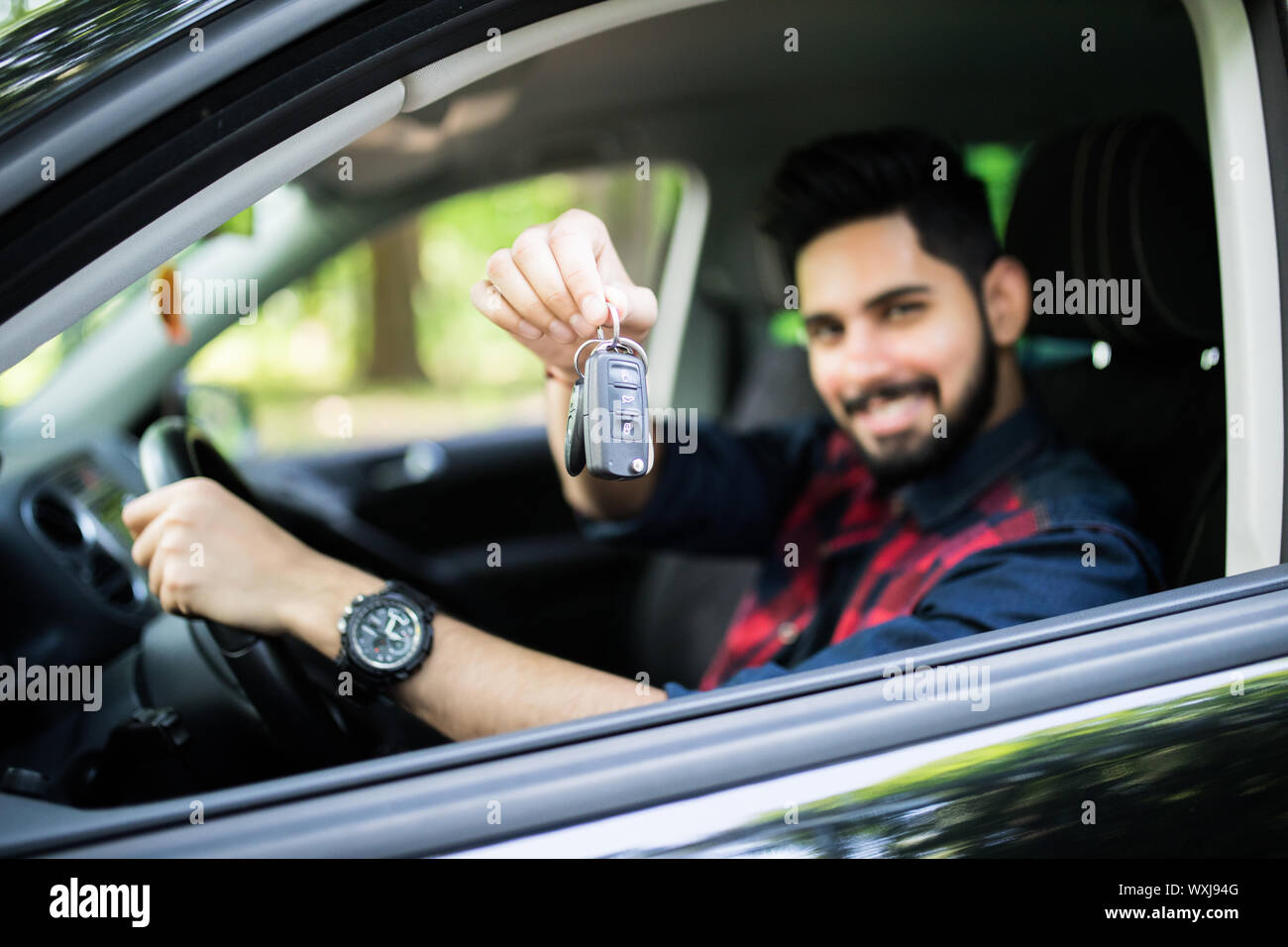 Indian man with car keys hi-res stock photography and images - Alamy