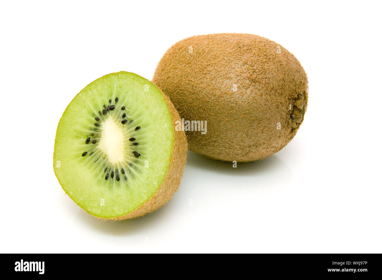 Parts of a kiwi on a white background Stock Photo - Alamy