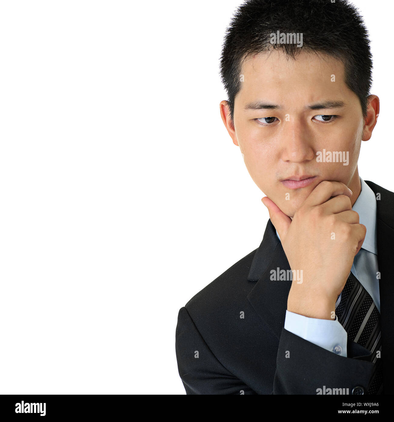 Thinking expression of young businessman on white background Stock ...
