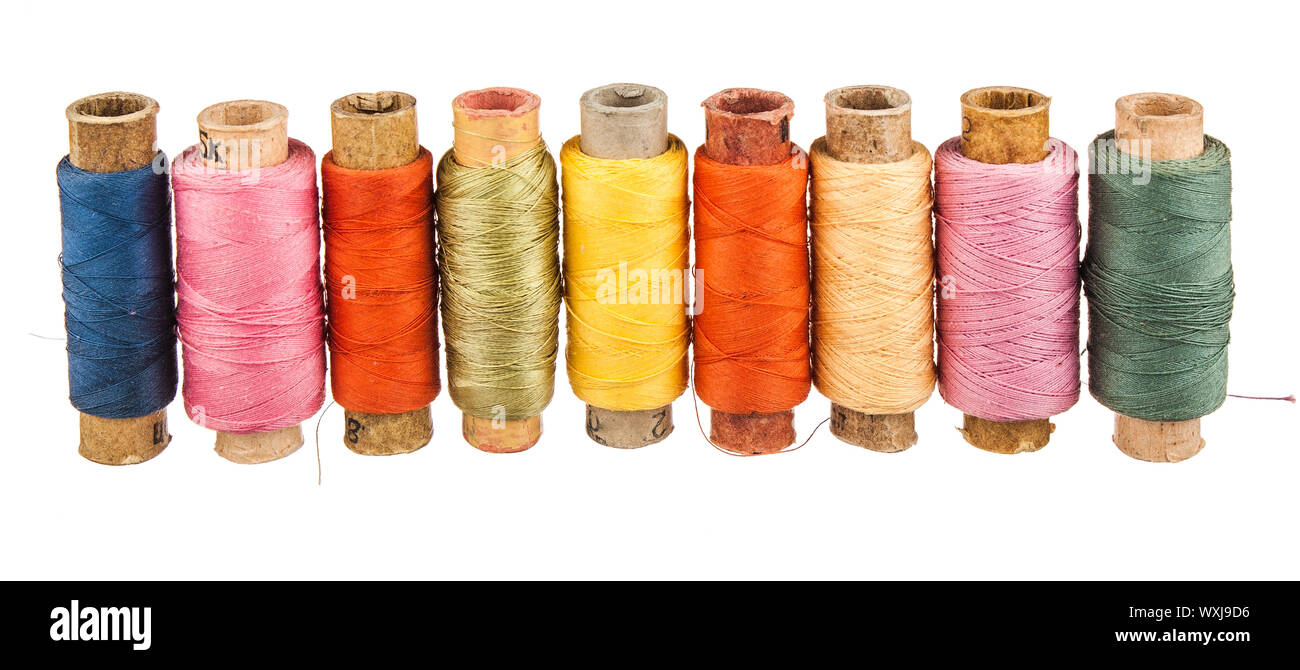 Sewing thread isolated on white background Stock Photo - Alamy